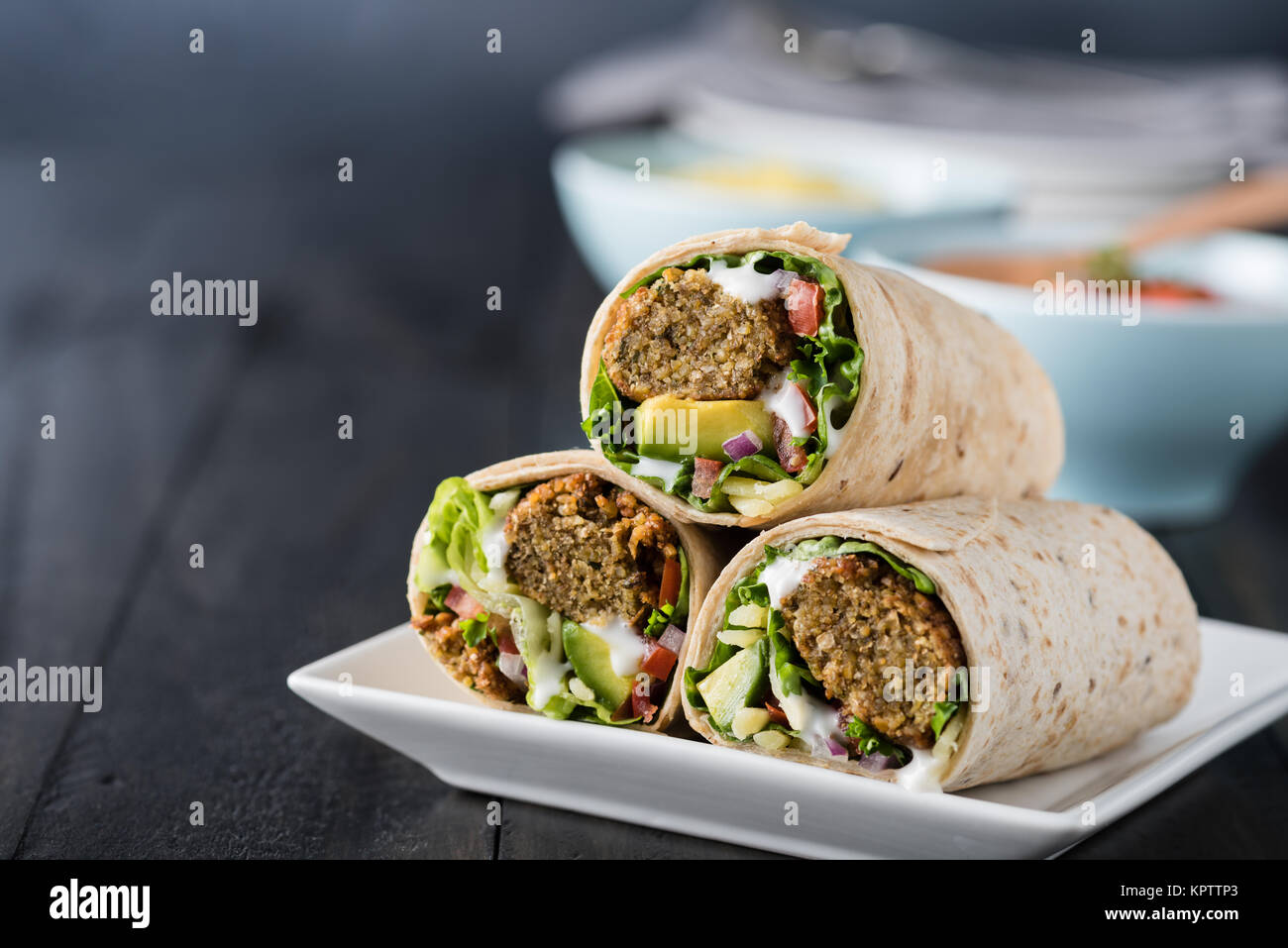 Vegetarian falafel wraps with avocado and cheese Stock Photo - Alamy