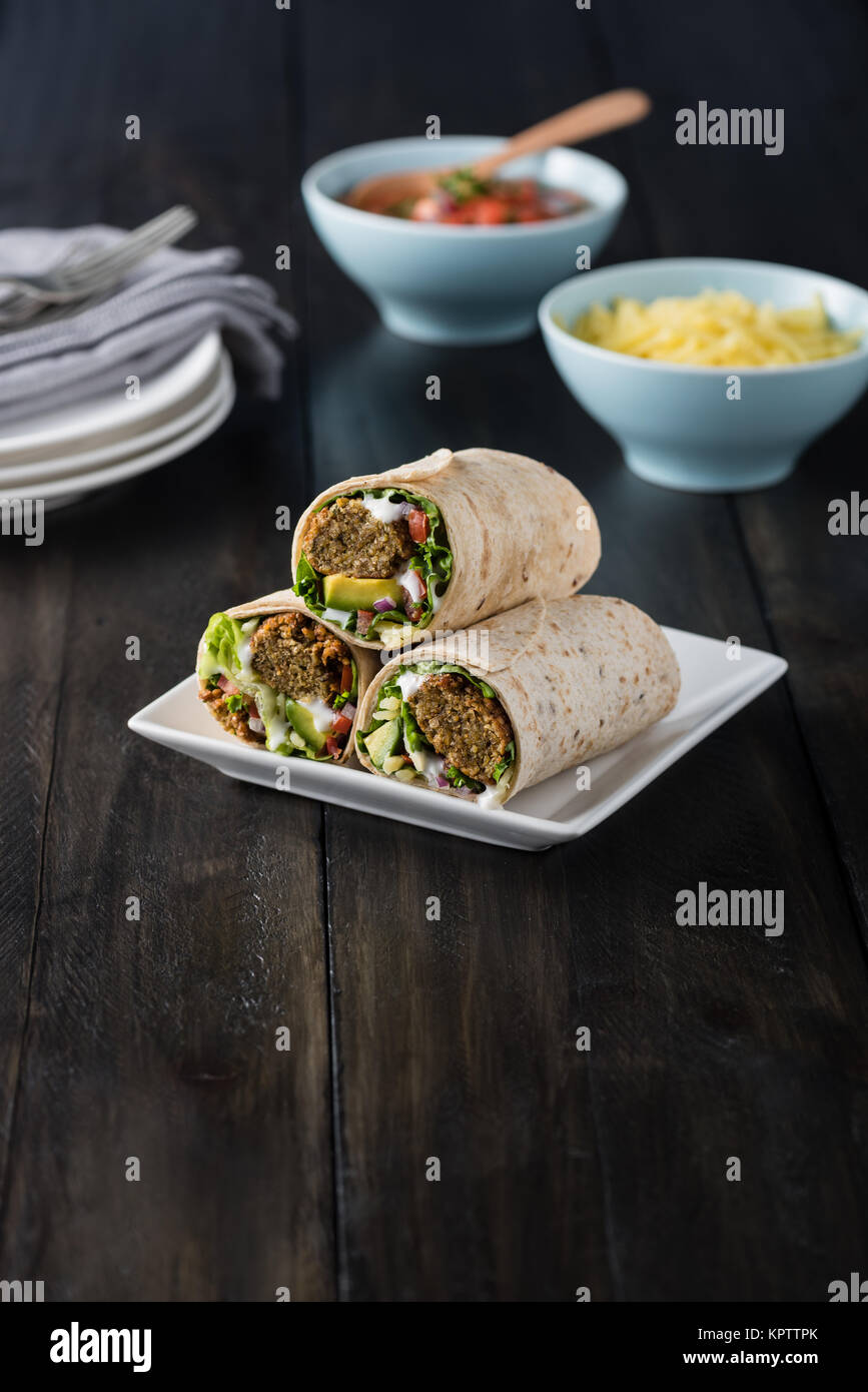 Vegetarian falafel wraps with avocado and cheese Stock Photo - Alamy
