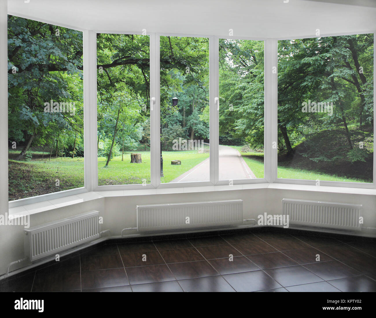 windows overlooking the city park Stock Photo - Alamy