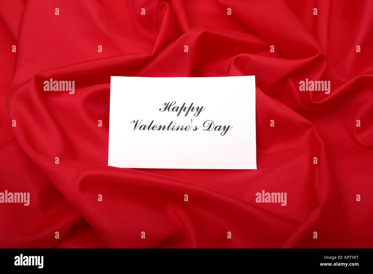blank greetings card on a red background. Left empty for the designer ...