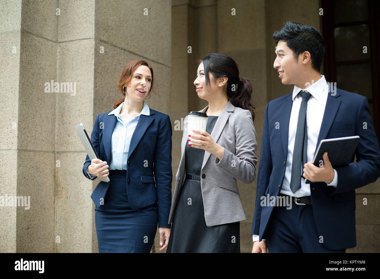 Business people walking at outdoor Stock Photo - Alamy