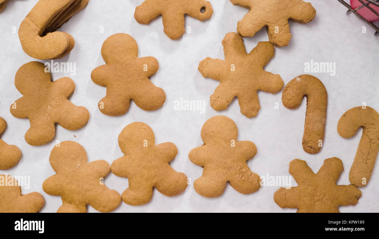 Decorating gingerbread cookies with royal icing for Christmas Stock ...