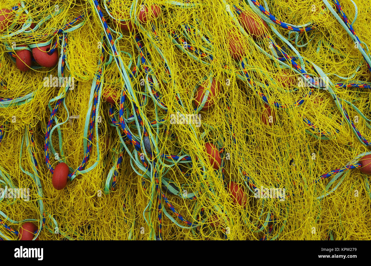 Bright yellow fishing net in a Greek port Stock Photo - Alamy