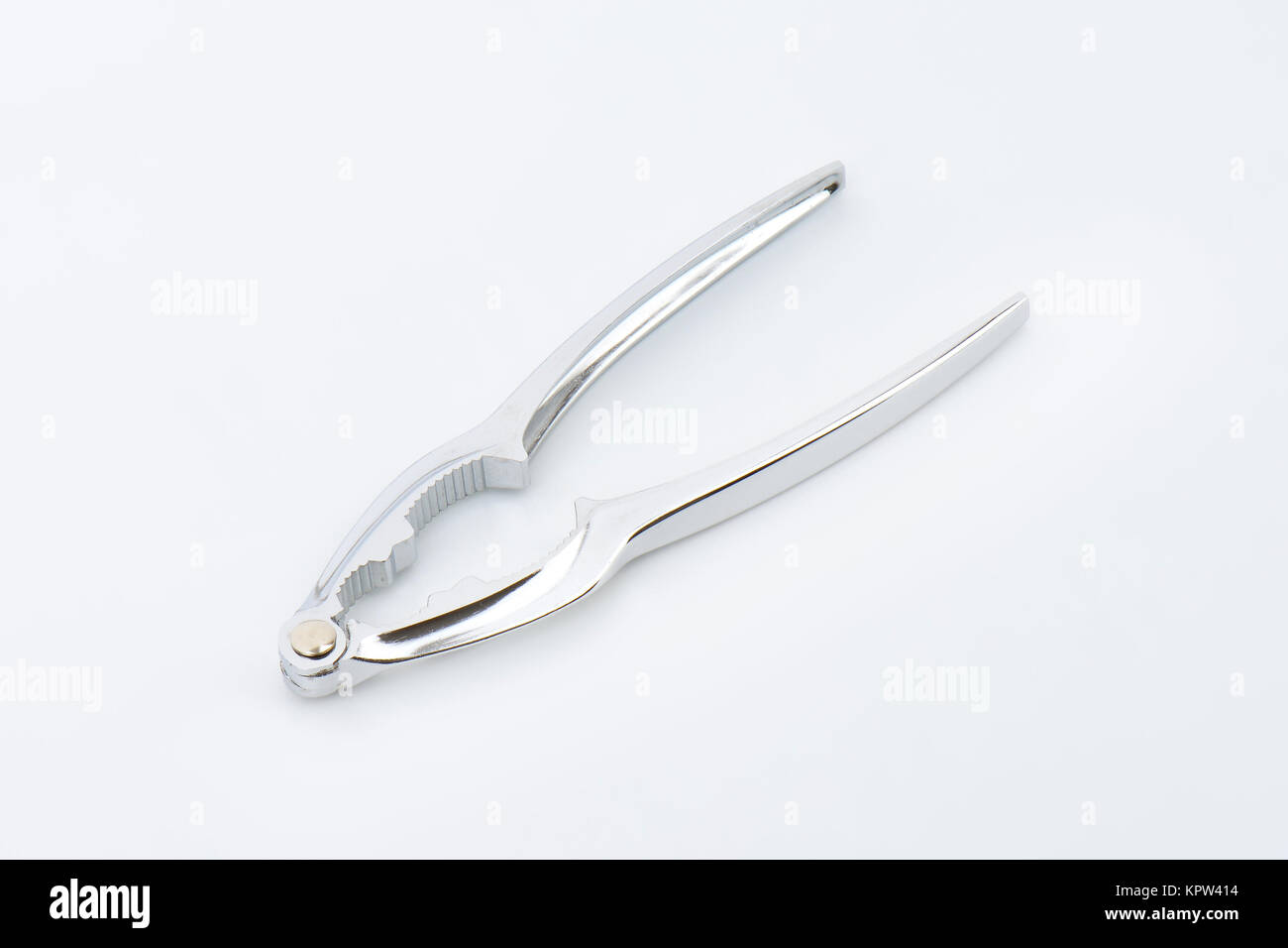 metal nut cracker Stock Photo - Alamy