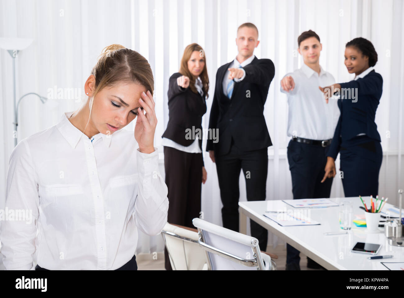 Frustrated Female Colleague In Office Stock Photo - Alamy