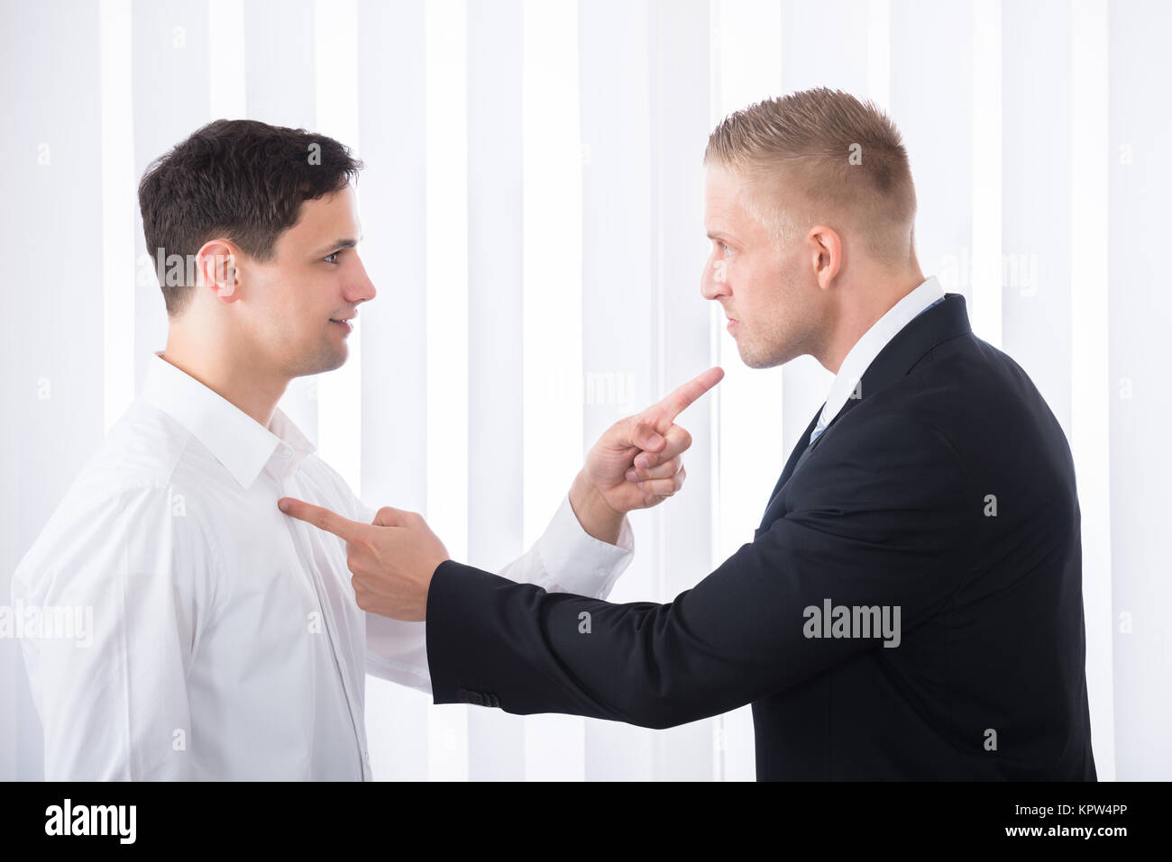 Businessmen Pointing Finger At Each Other Stock Photo - Alamy