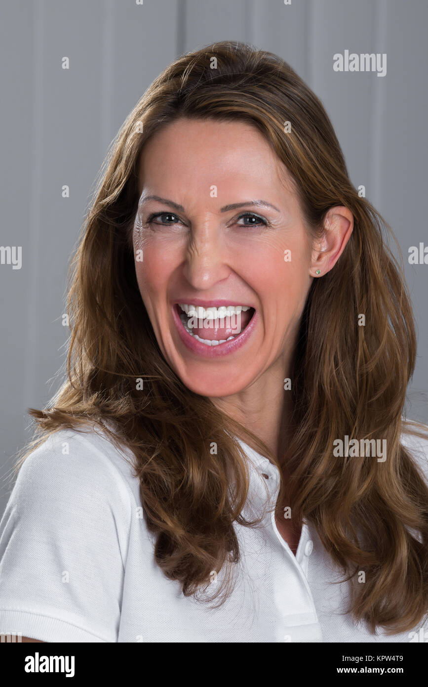 Portrait Of Woman Laughing Stock Photo - Alamy