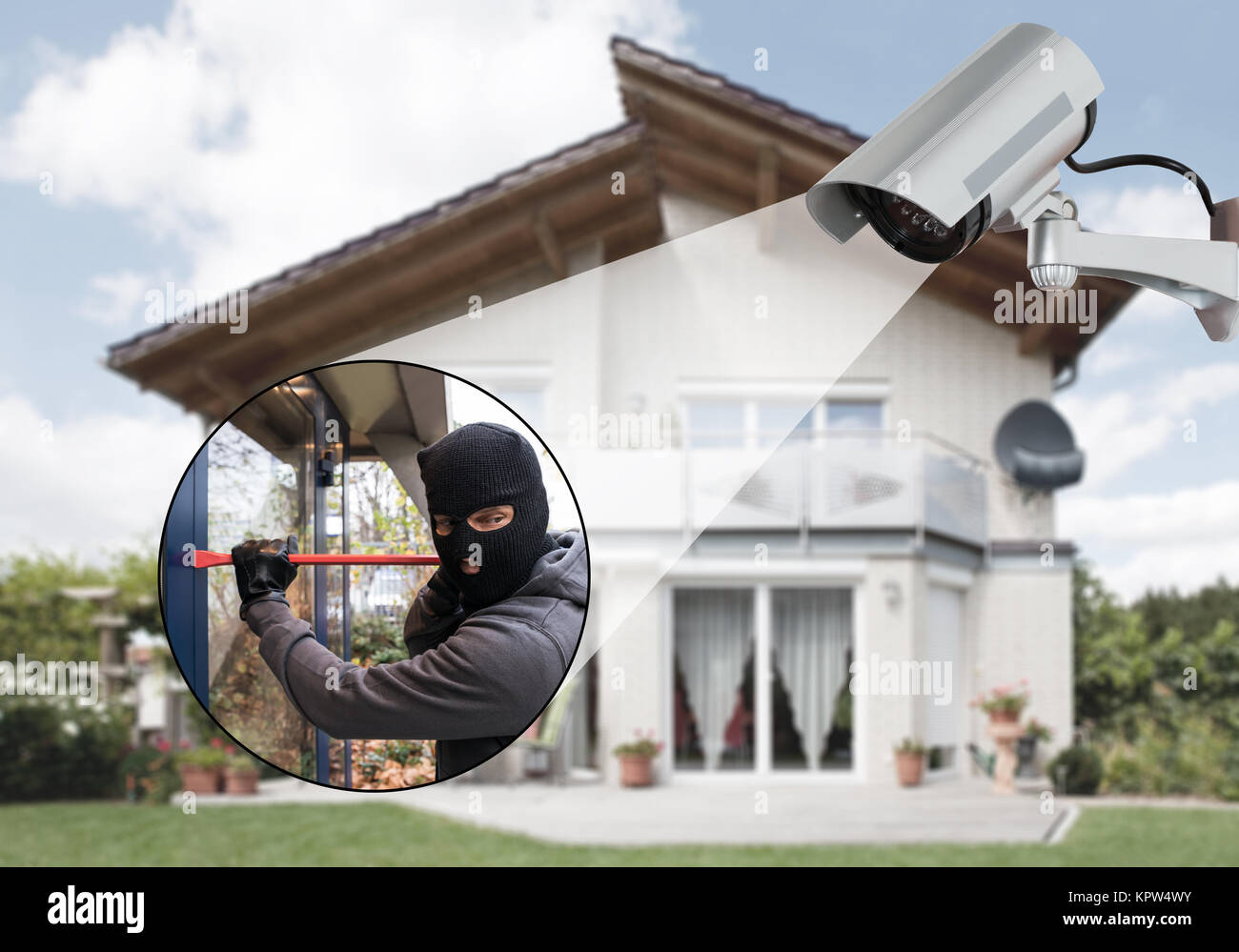 Technician Adjusting CCTV Camera Stock Photo - Alamy