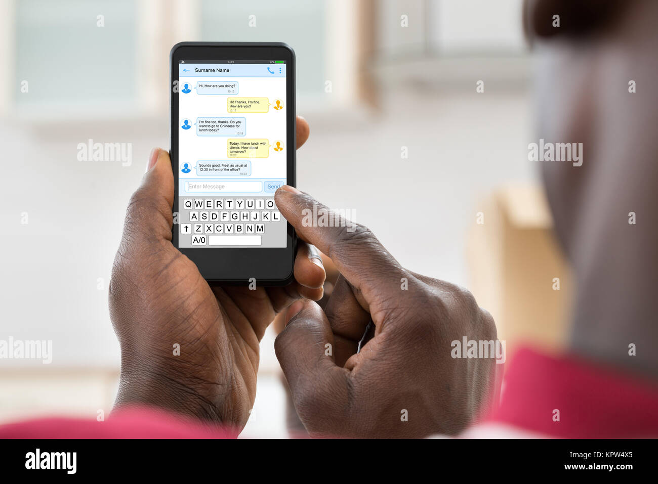 African Man Using Cellphone Stock Photo - Alamy