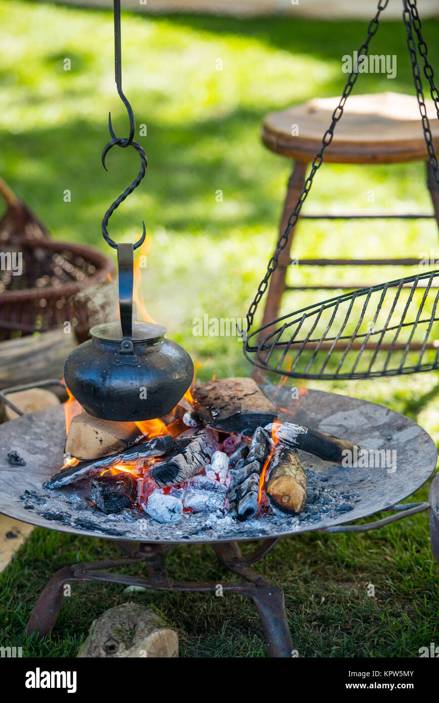 boiling over the fire Stock Photo - Alamy