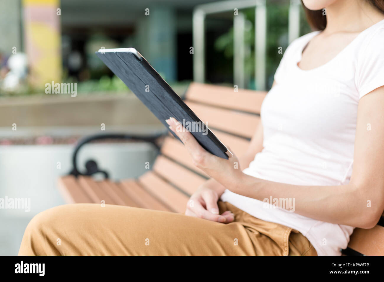 Woman using tablet Stock Photo - Alamy
