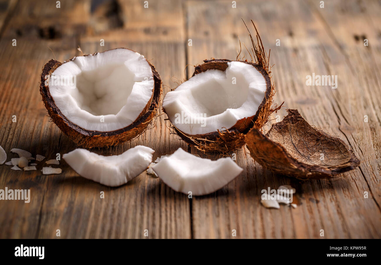 Coconut cut in half Stock Photo - Alamy