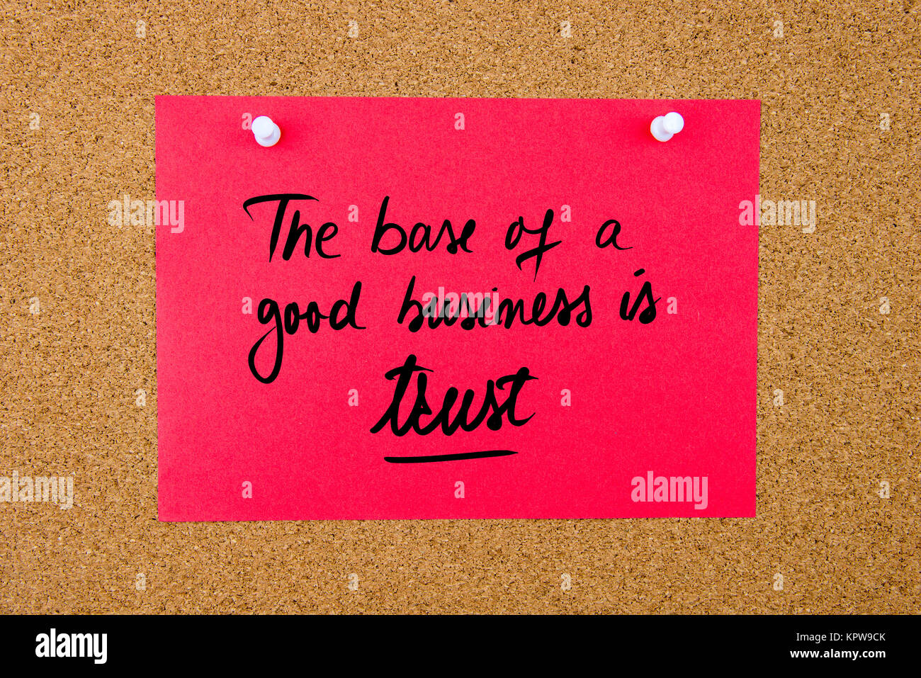 Red paper note with handwritten text on cork board Stock Photo - Alamy