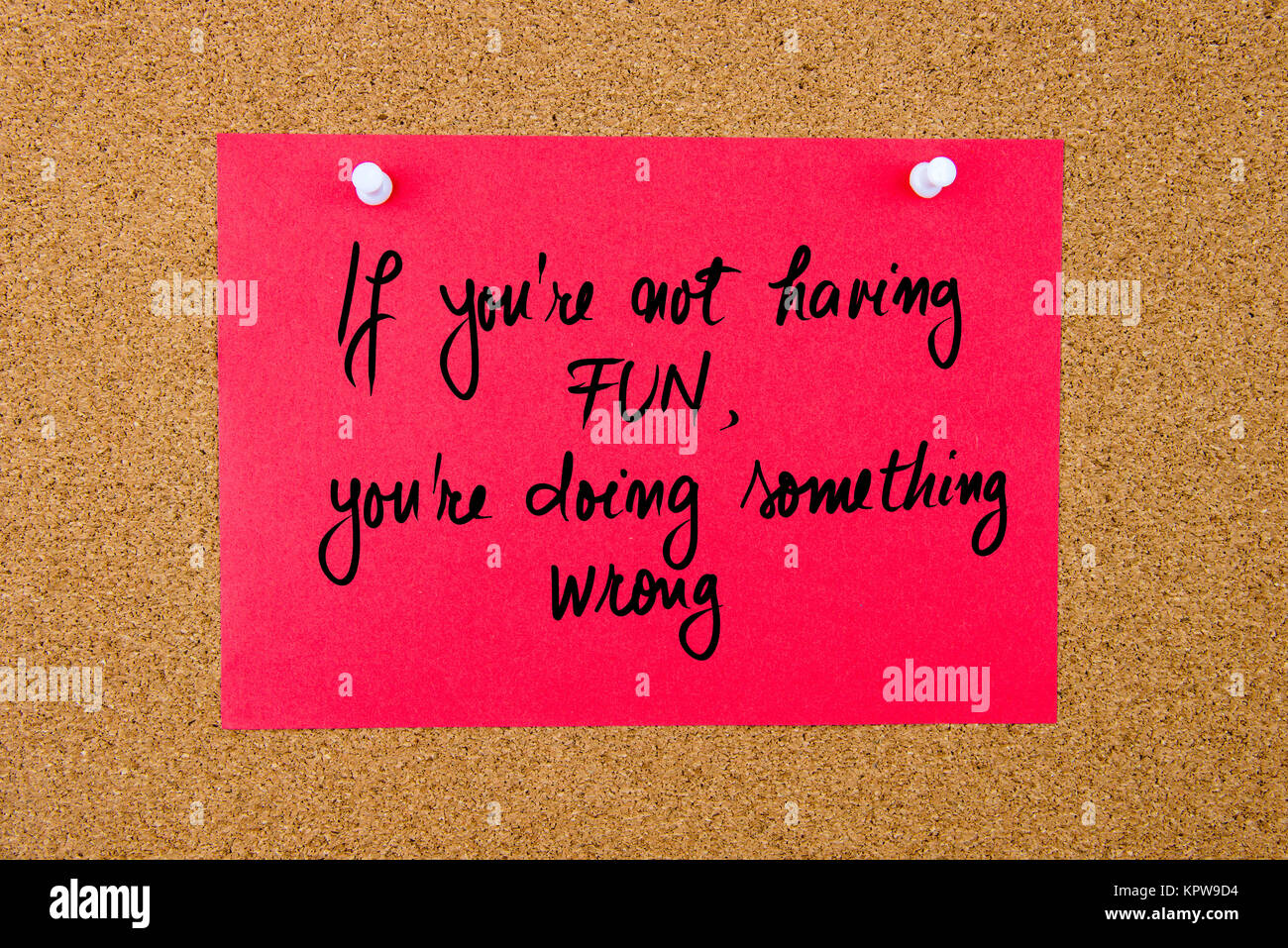 Red paper note with handwritten text on cork board Stock Photo - Alamy