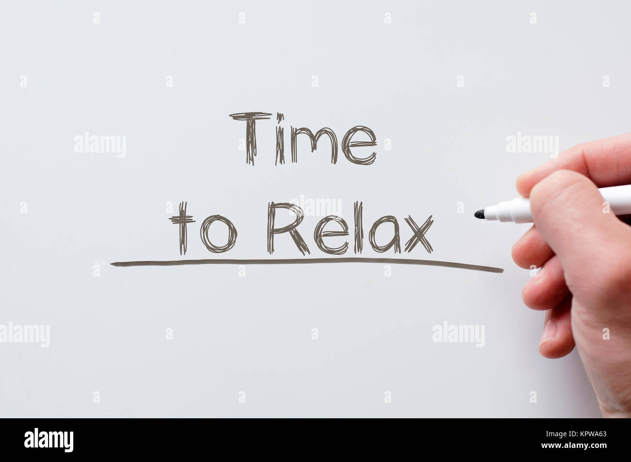 Time to relax written on whiteboard Stock Photo - Alamy