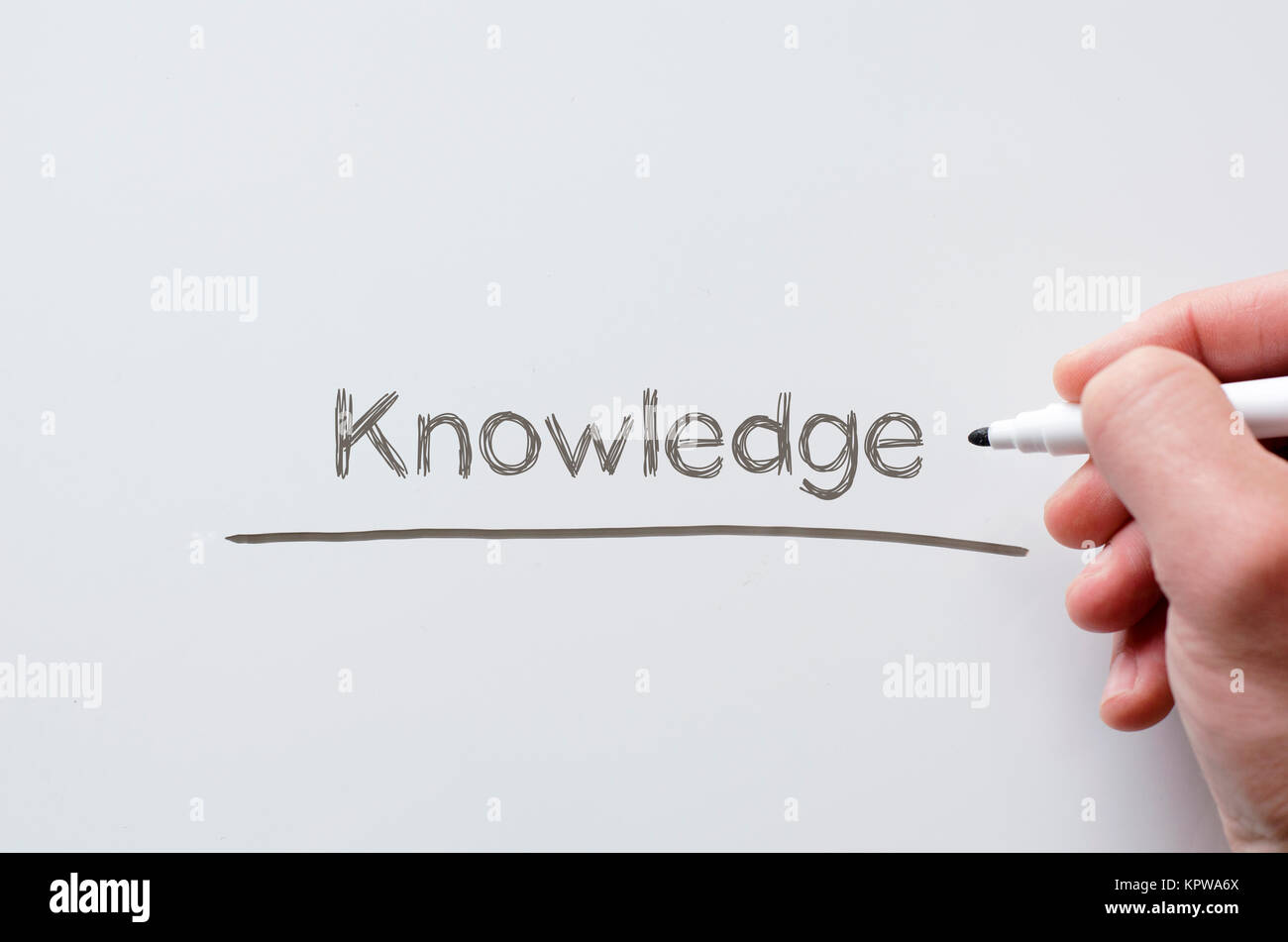 Knowledge written on whiteboard Stock Photo - Alamy