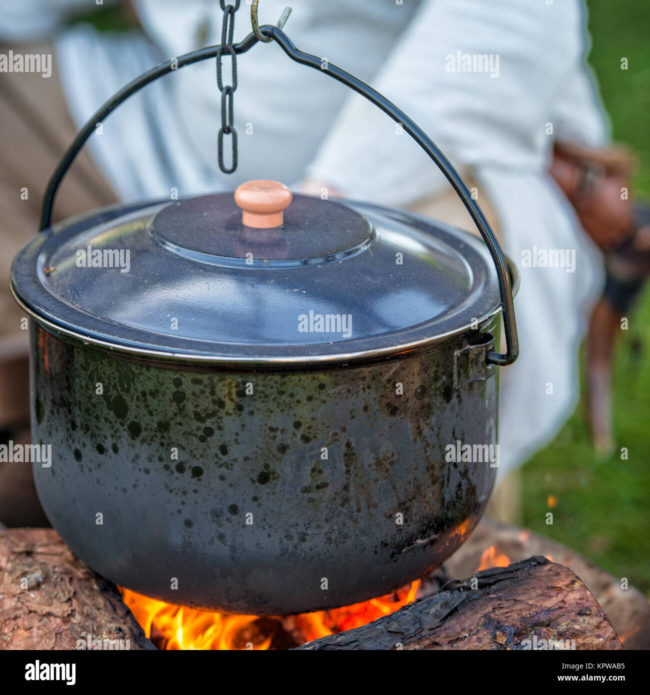 boiling over the fire Stock Photo - Alamy