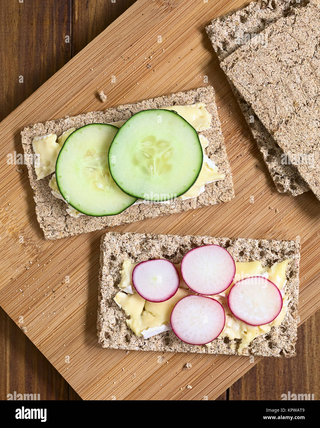 Wholemeal Rye Crispbread with Brie, Radish and Cucumber Stock Photo - Alamy