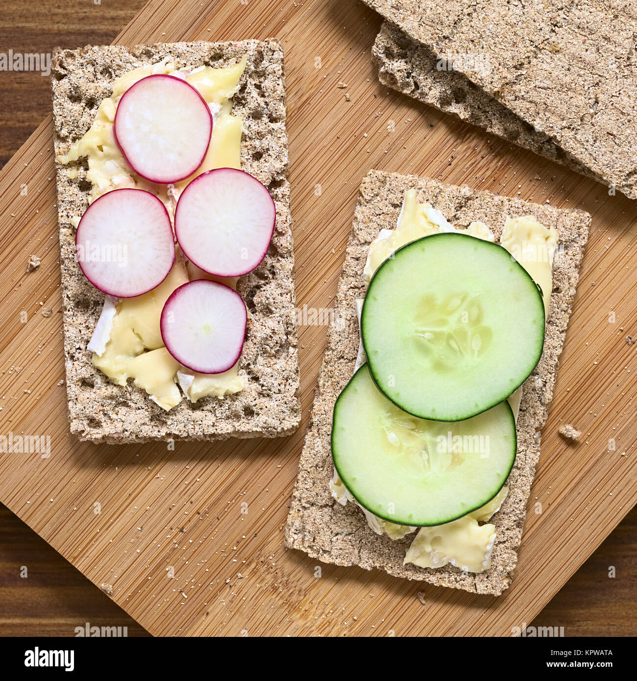 Wholemeal Rye Crispbread with Brie, Radish and Cucumber Stock Photo - Alamy