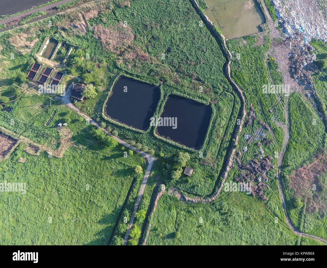 Sewage treatment plant near the city sewage dump Stock Photo - Alamy