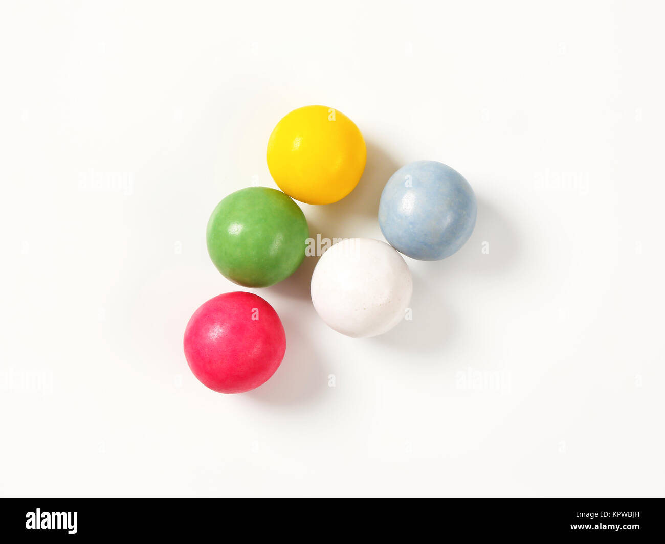 Yellow candy balls Stock Photo - Alamy