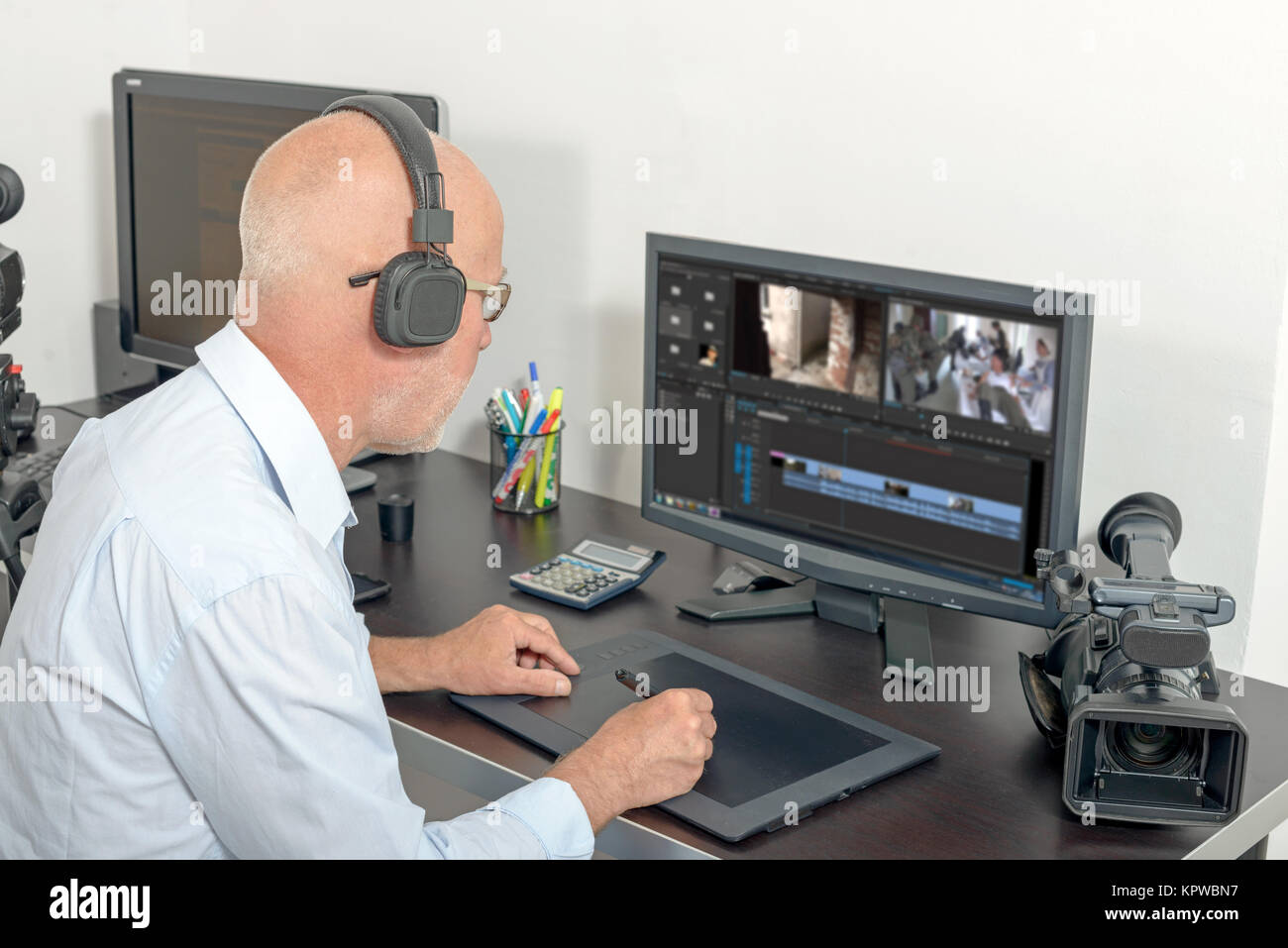 video editor in his studio Stock Photo - Alamy