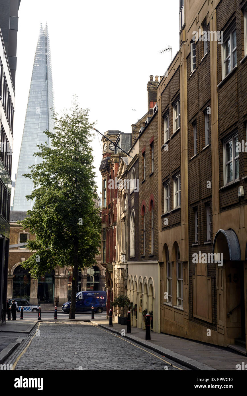 View of the shard building in London taken down a side street in the ...