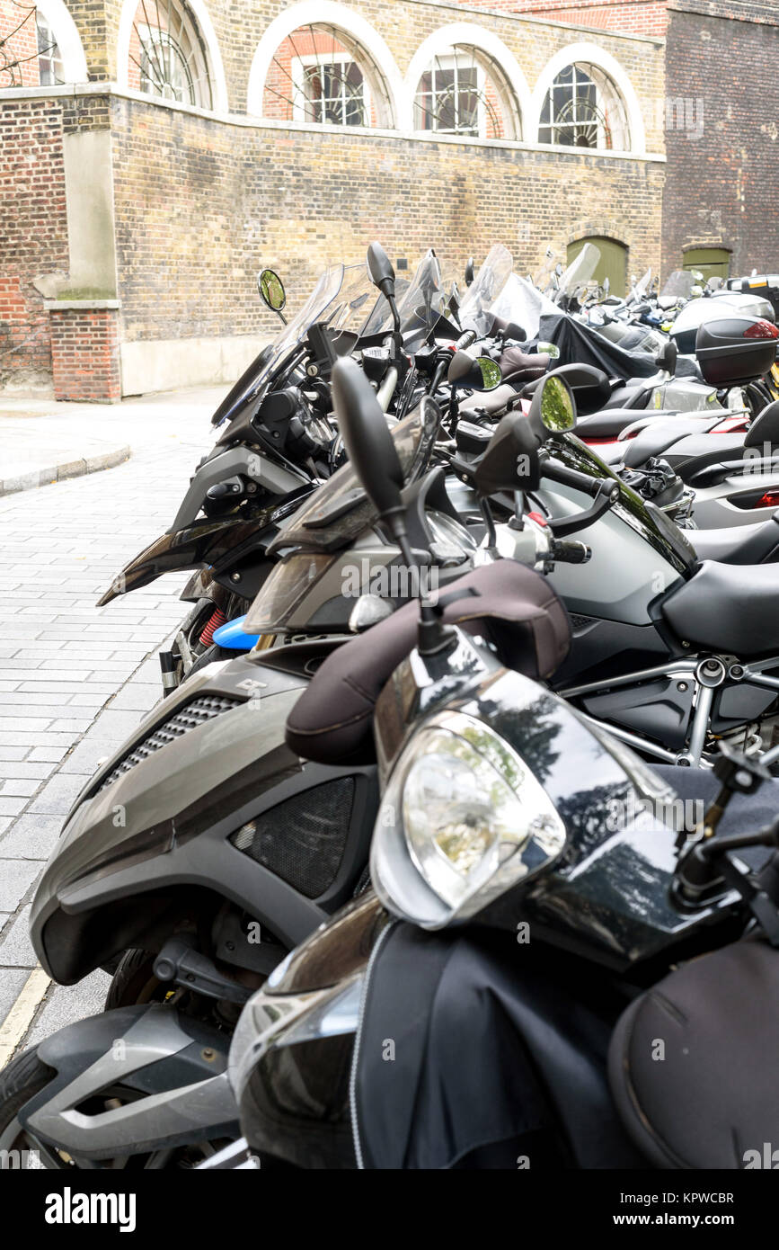 Row of parked motorcycles, the motorbikes are an ideal way of commuting ...