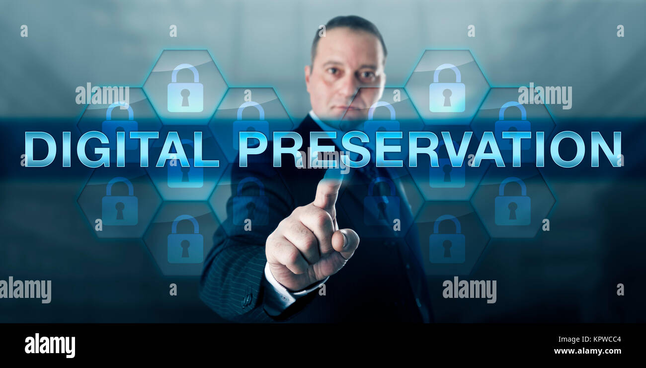 Library Manger Touching DIGITAL PRESERVATION Stock Photo - Alamy