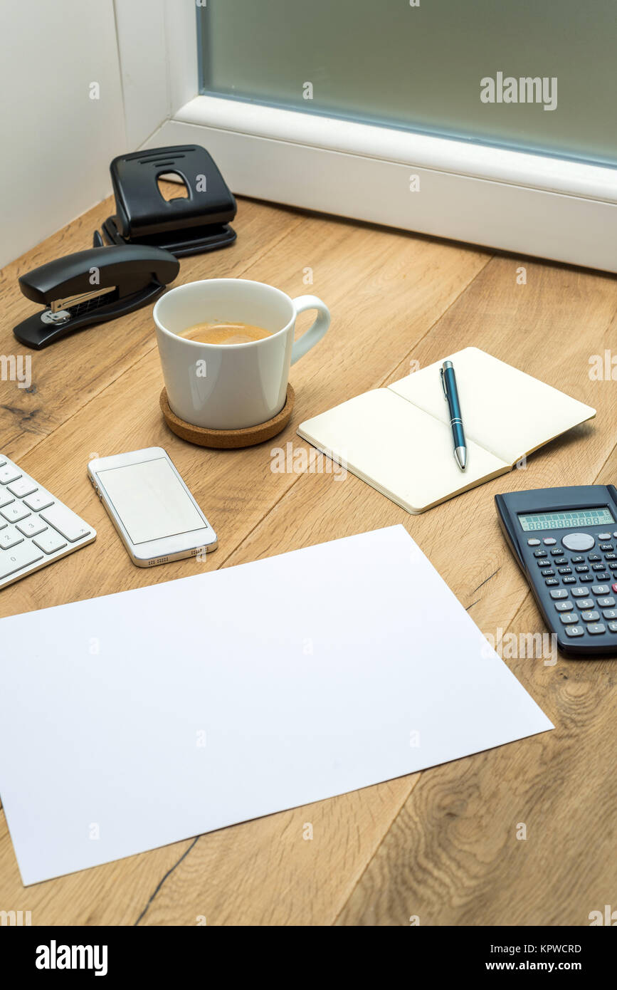 Wooden workspace with office supplies and coffee Stock Photo - Alamy
