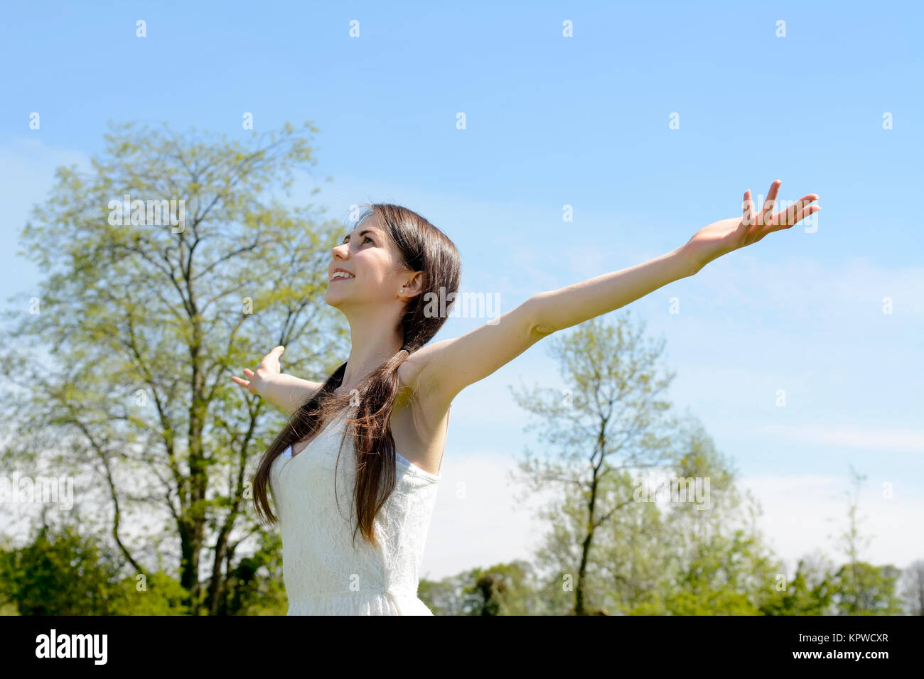 young woman cheering Stock Photo - Alamy