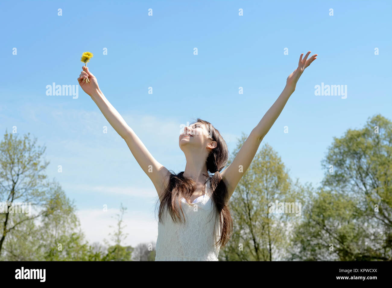young woman cheering Stock Photo - Alamy
