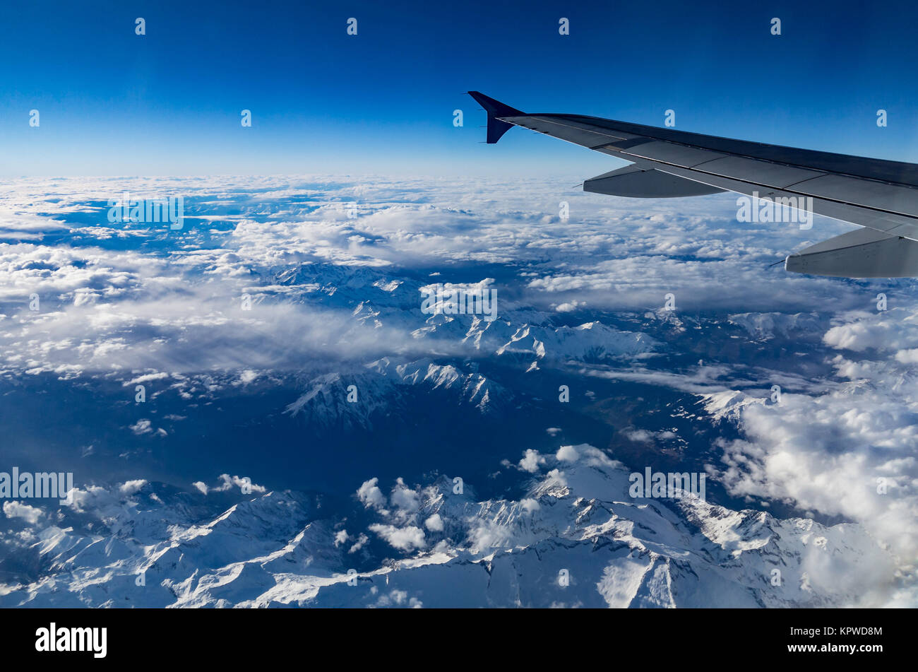 view from plane with wings over france,atlantic and alps Stock Photo ...