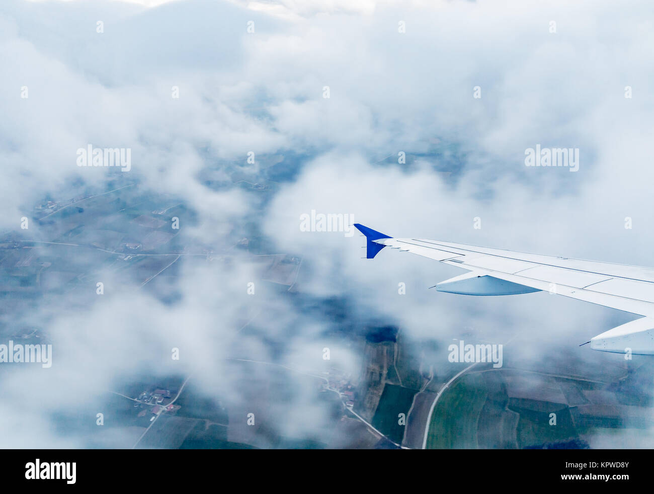 view from the plane on landing approach over munich with clouds Stock ...