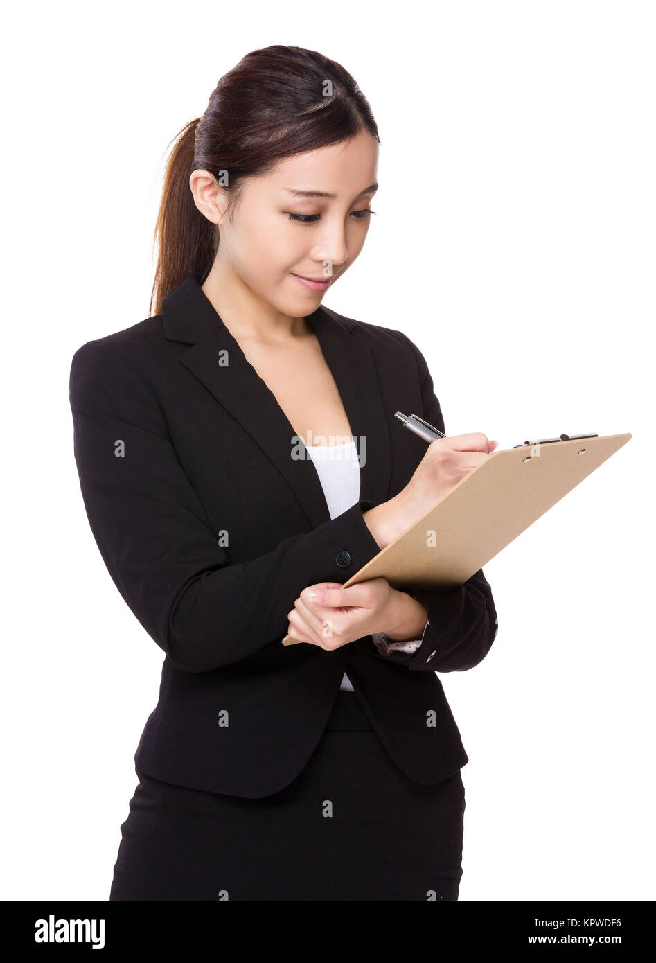 Asian Young businesswoman take note on clipboard Stock Photo - Alamy