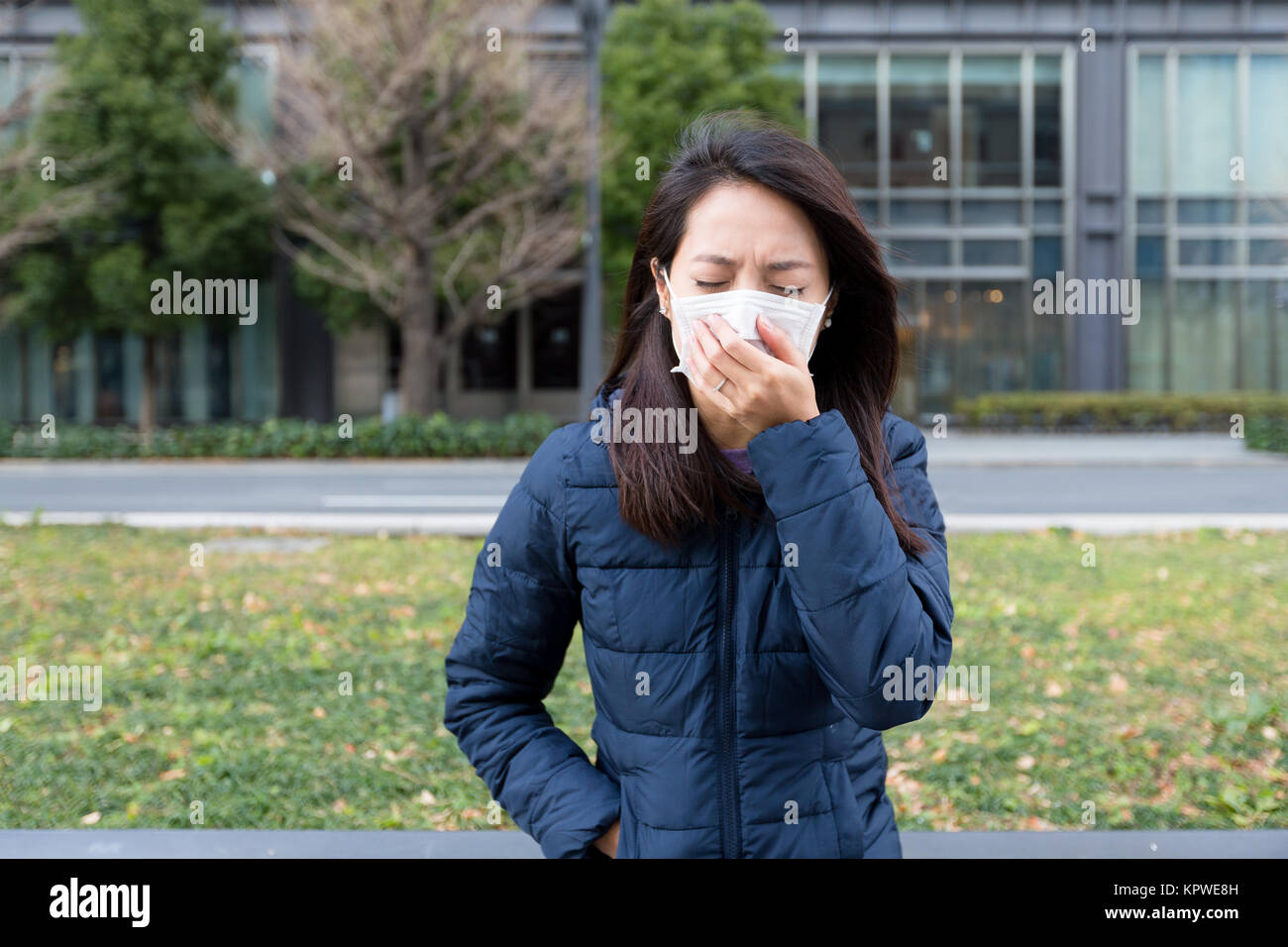 Woman wearing face mask at outdoor Stock Photo - Alamy