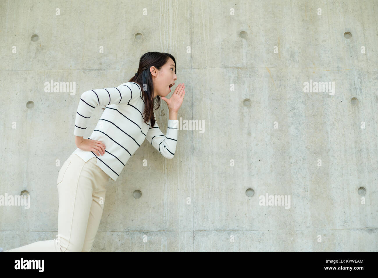 Woman shouting something Stock Photo - Alamy
