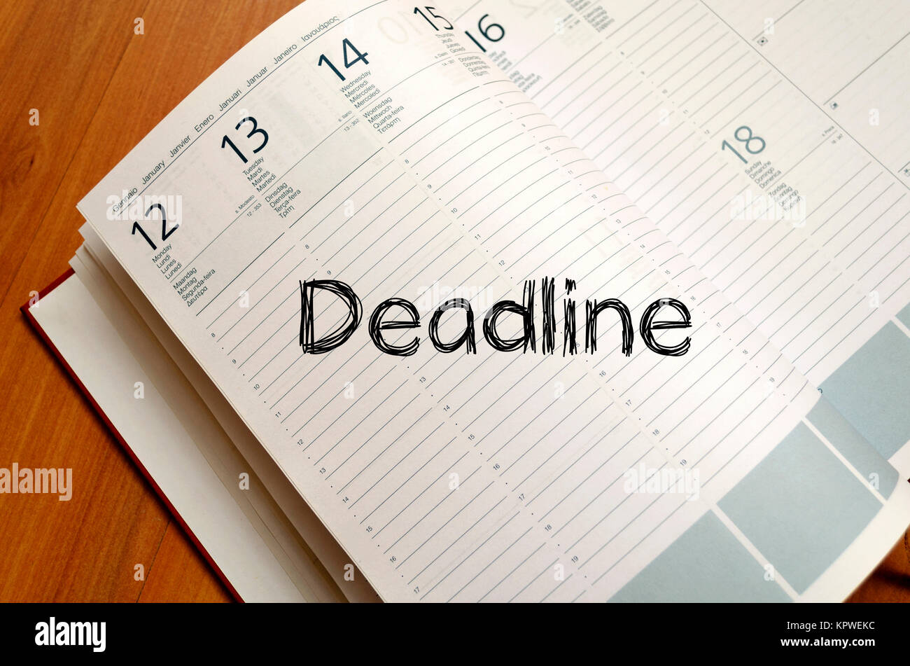 Deadline write on notebook Stock Photo - Alamy