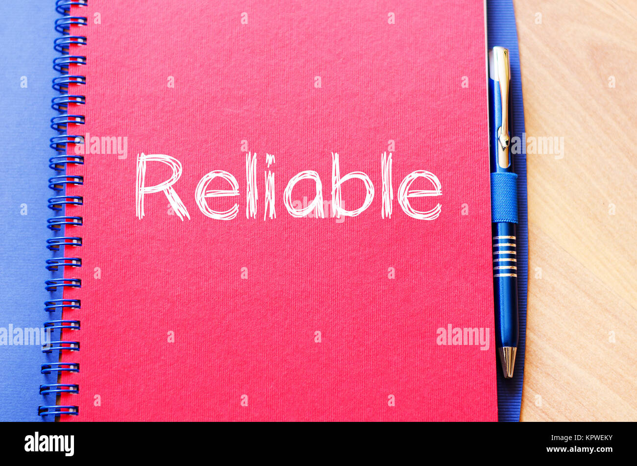 Reliable write on notebook Stock Photo - Alamy