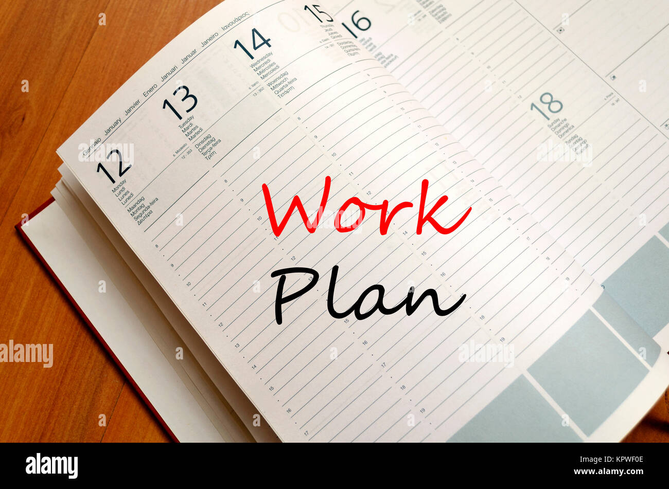 Work plan write on notebook Stock Photo - Alamy