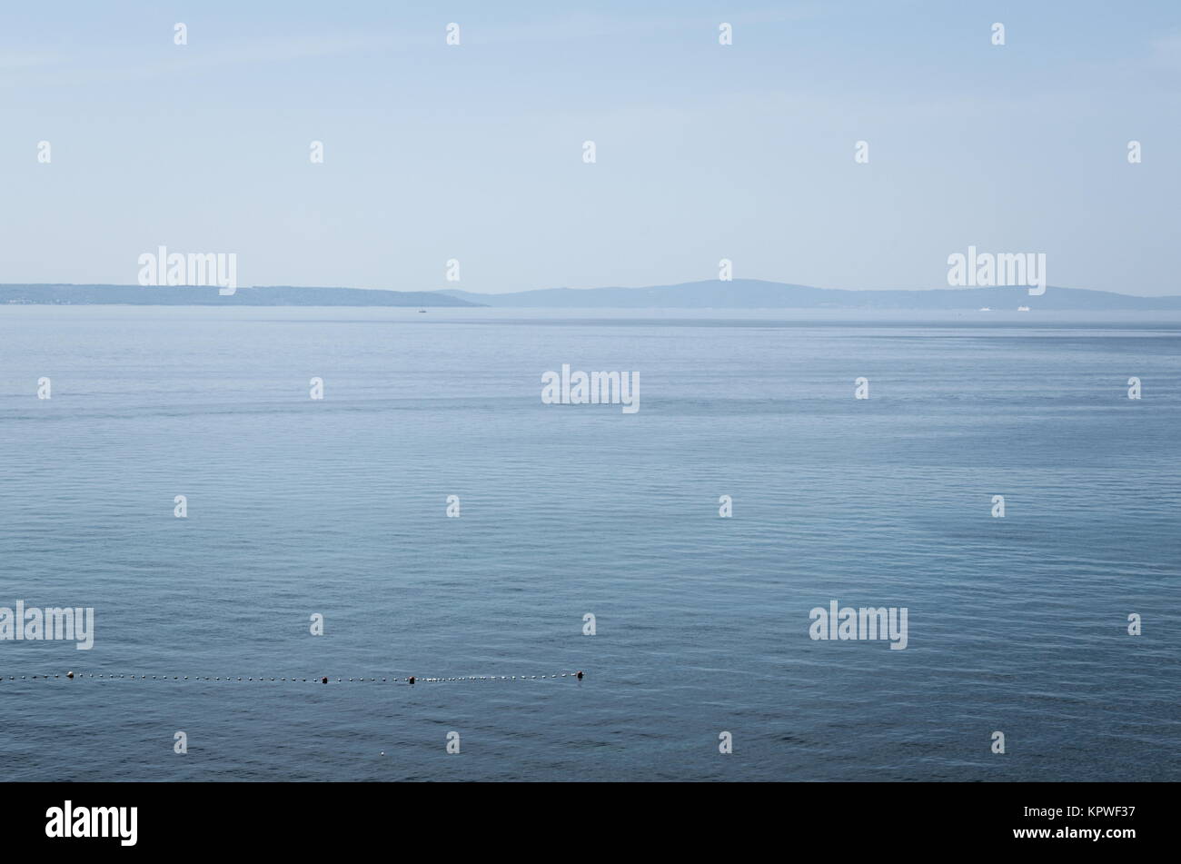 Blue Sea Bay Stock Photo - Alamy