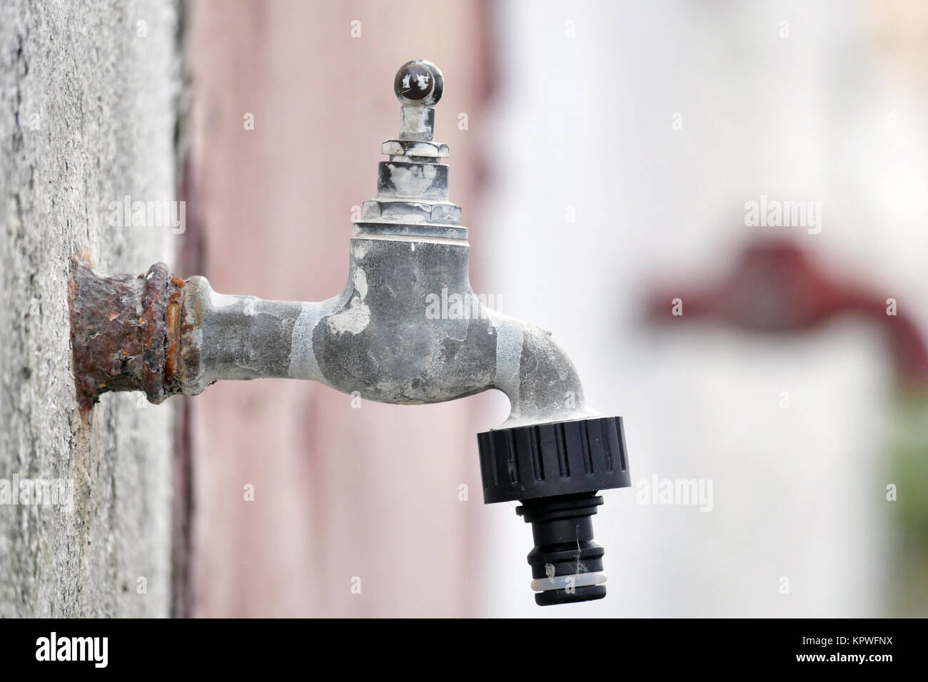 Old outside garden tap hi-res stock photography and images - Alamy