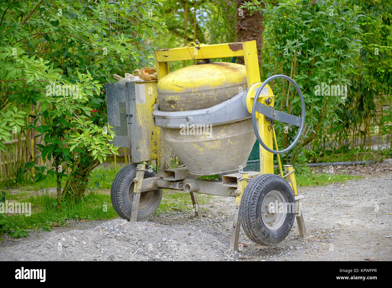 yellow concrete mixer Stock Photo - Alamy