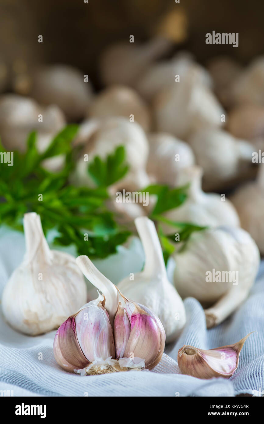 Garlic for cooking on the table of the kitchen Stock Photo - Alamy