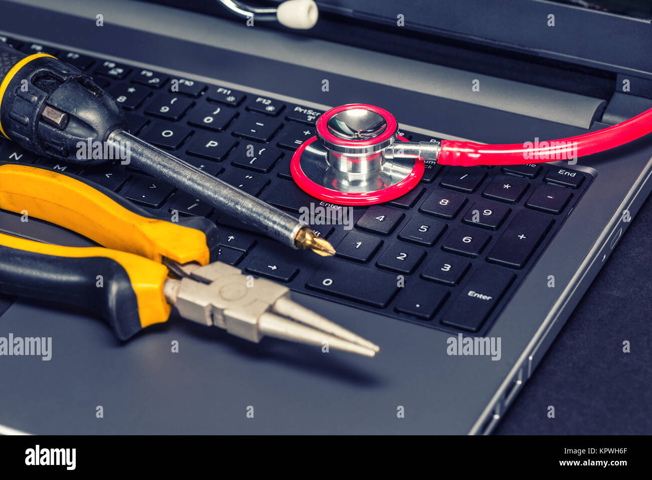 Laptop service concept Stock Photo - Alamy