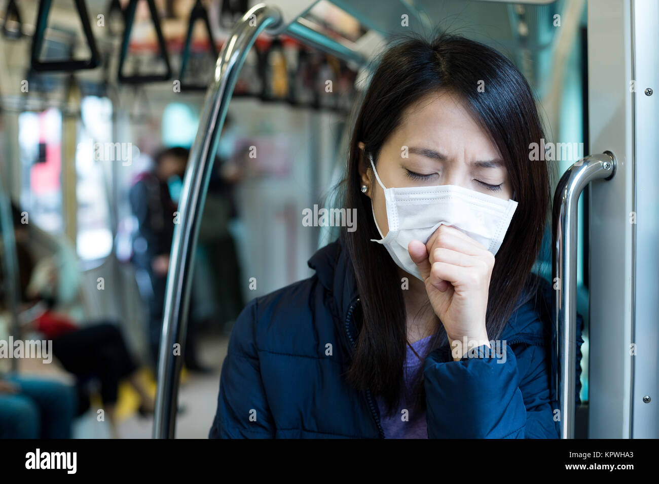 Woman wearing face mask in train compartment Stock Photo - Alamy