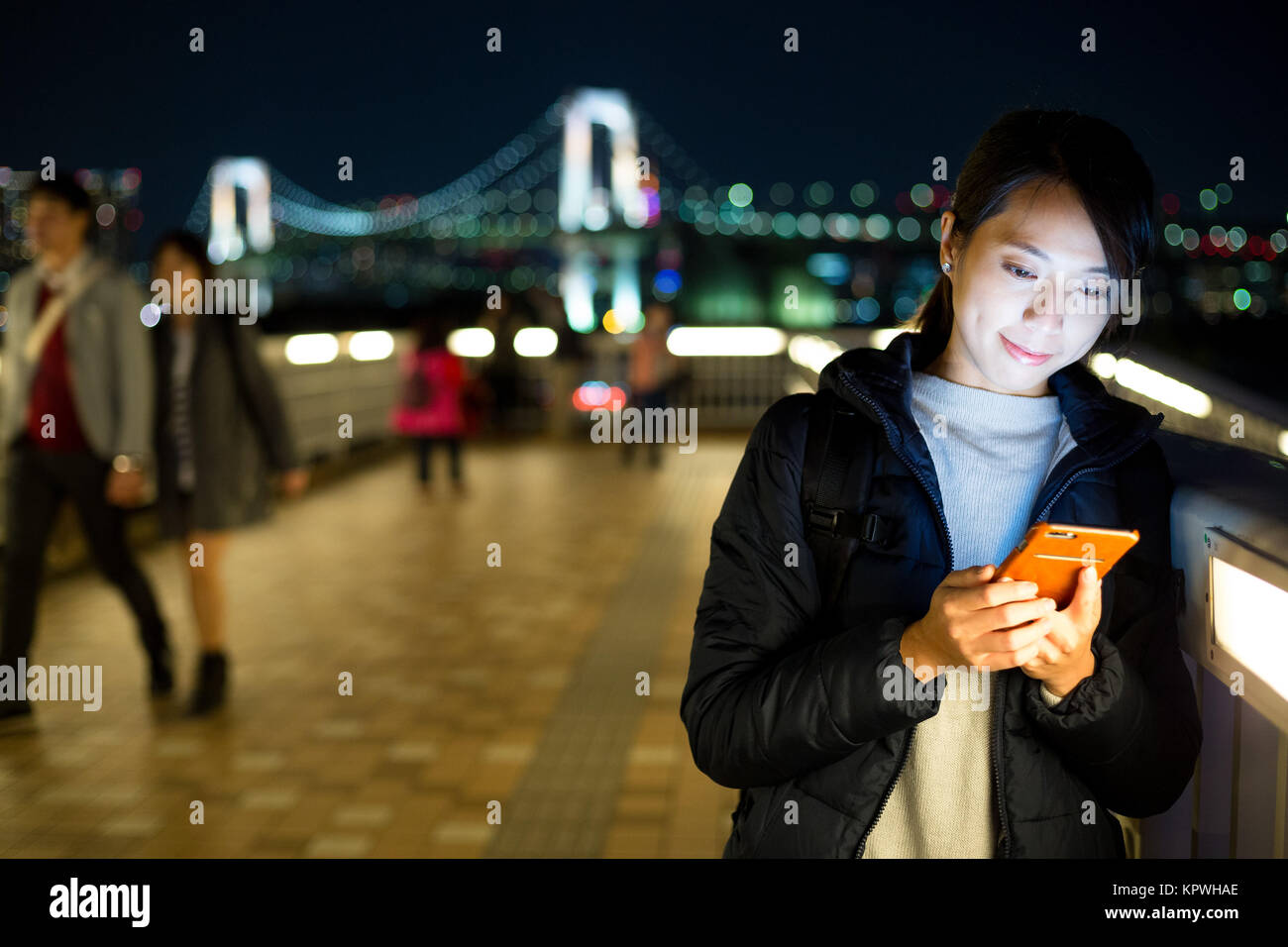 Woman sending text message on phone Stock Photo - Alamy