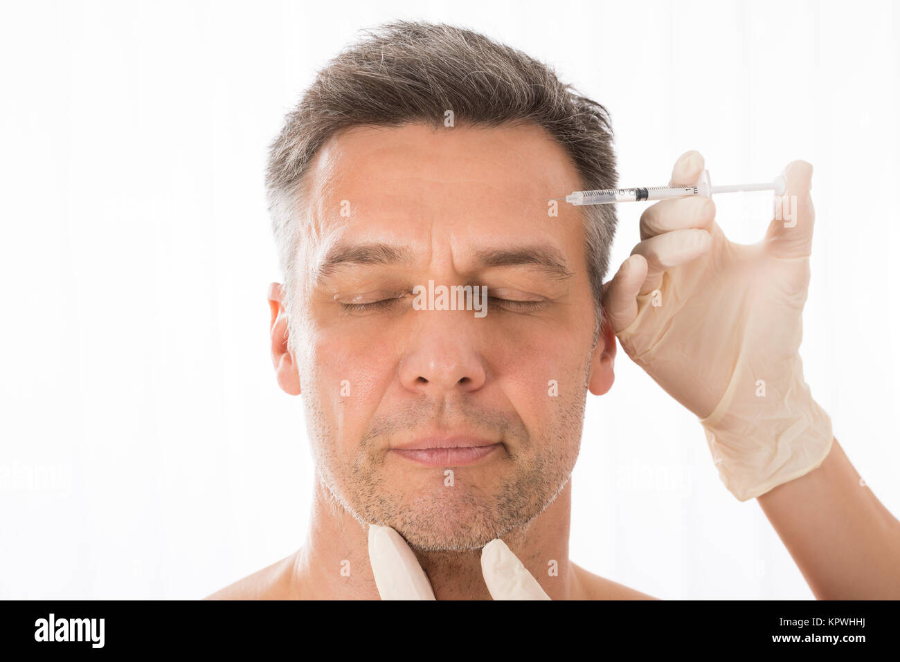 Mature Man Get Injection On His Face Stock Photo - Alamy