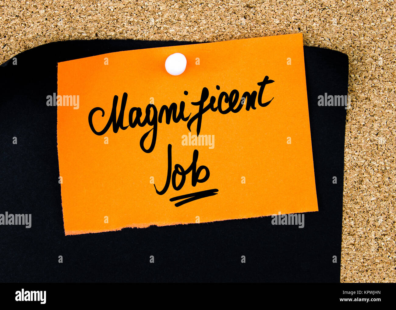 Magnificent Job written on orange paper note Stock Photo - Alamy