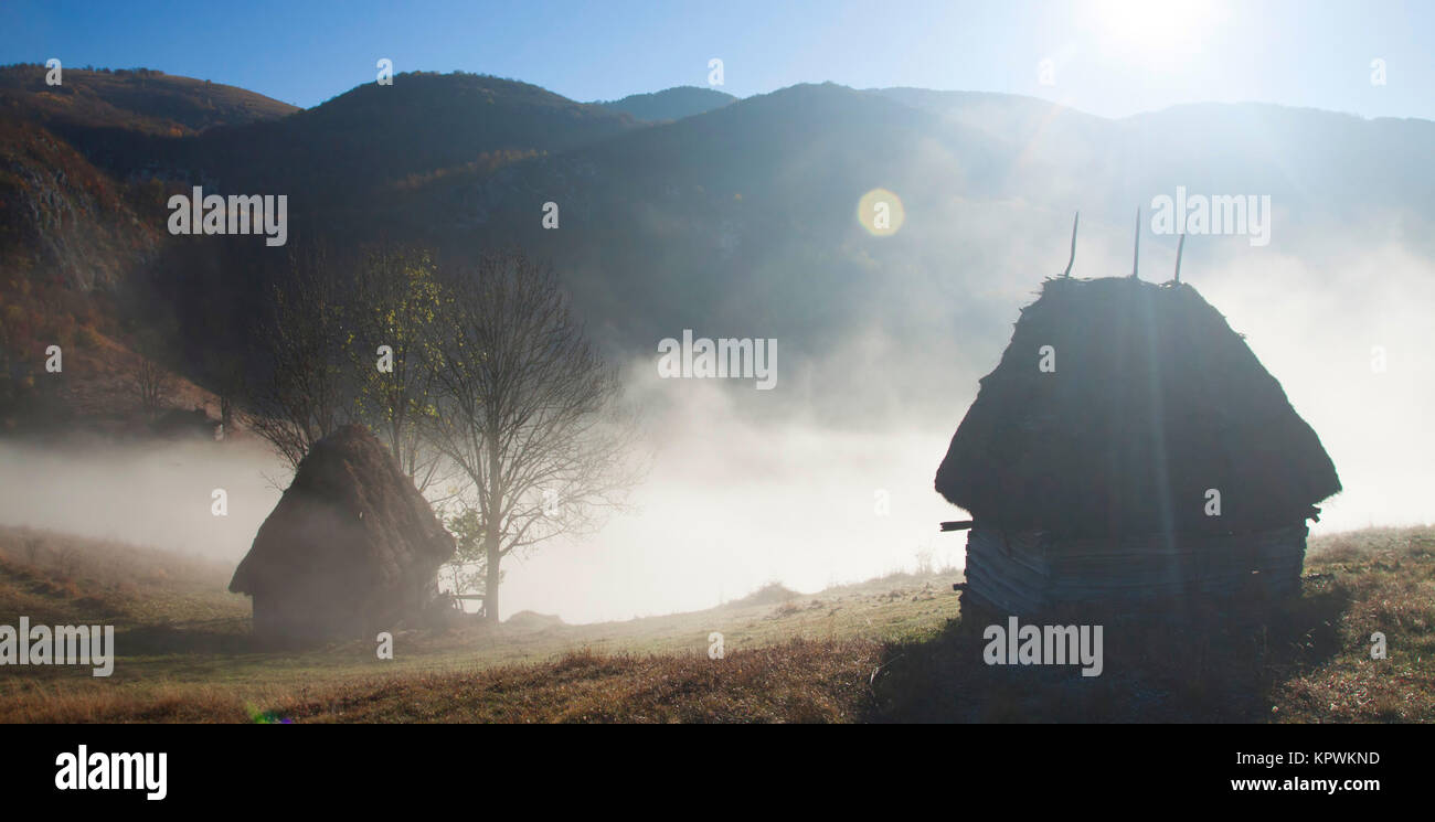 Small cottage in the mountains-panoramic view Stock Photo - Alamy